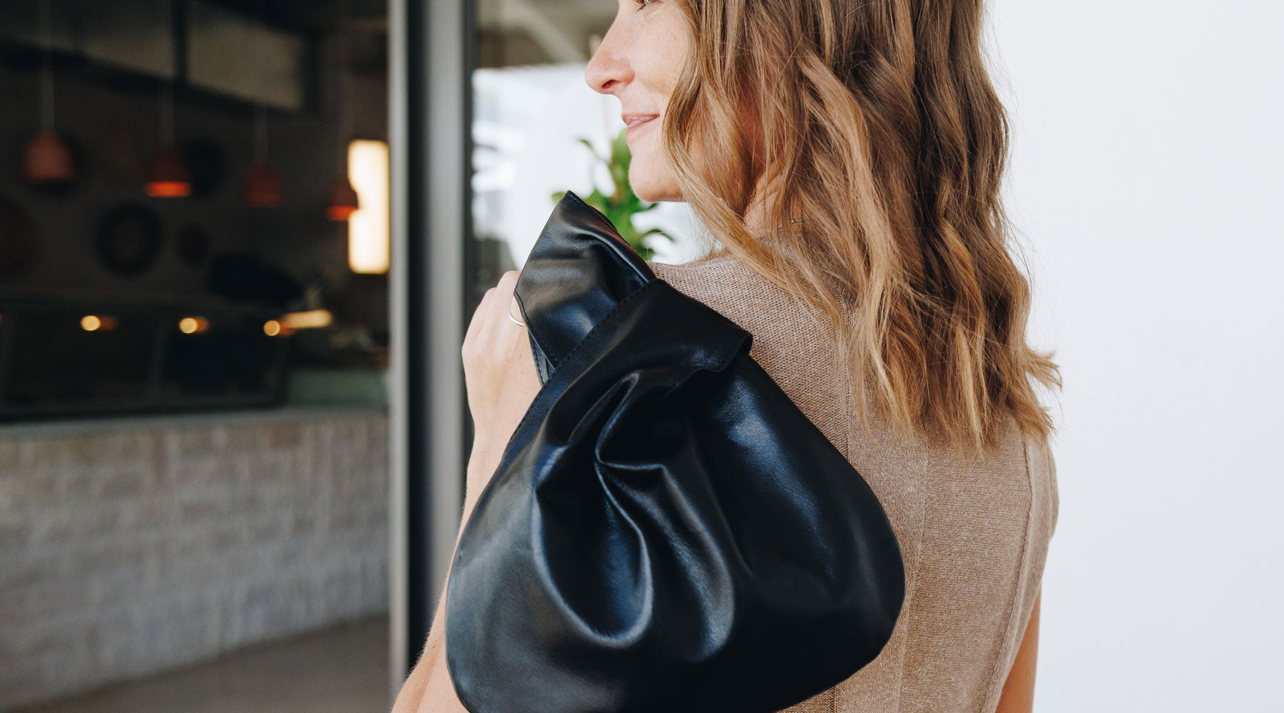 W On The Move | Leather Wrist Bags – Woman On The Move